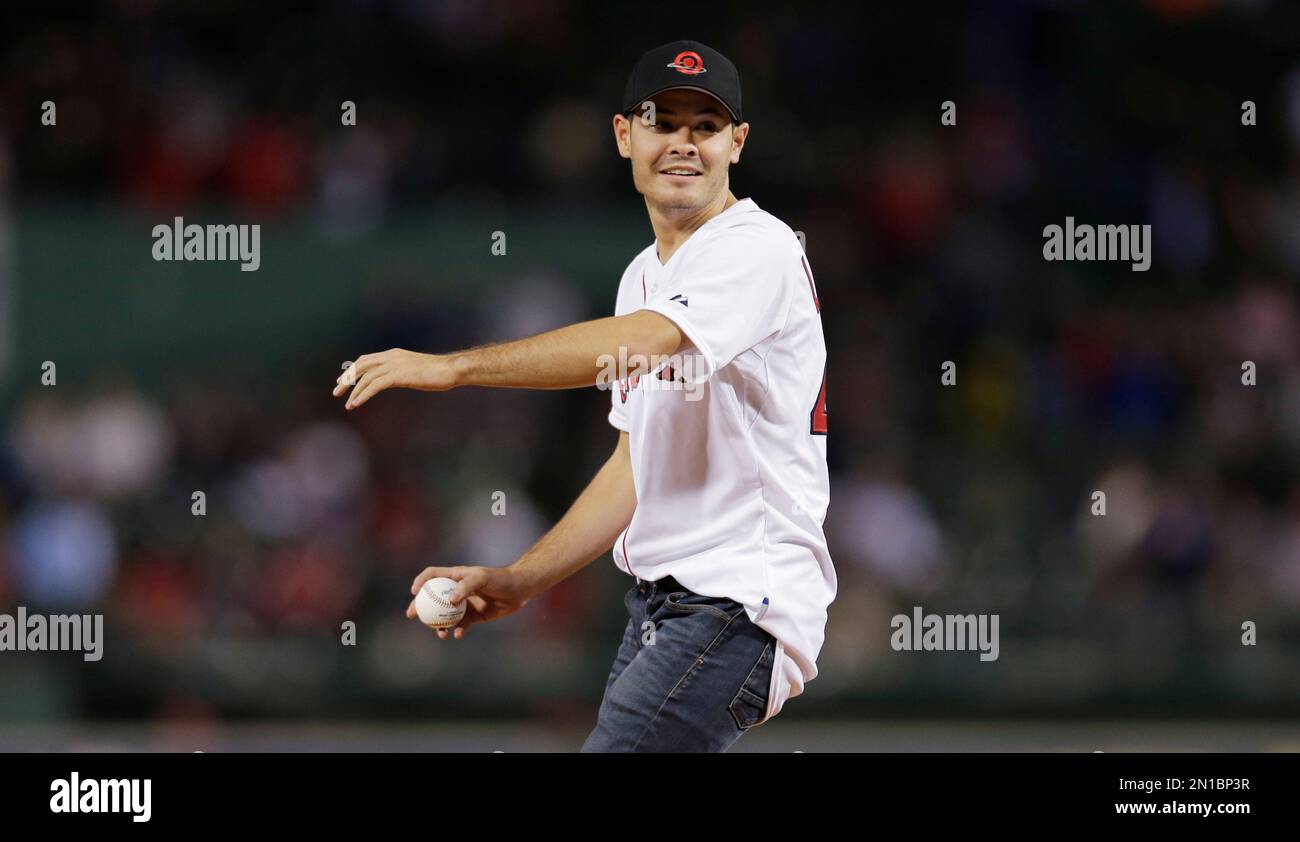 NASCAR driver Kyle Larson delivers the ceremonial first pitch before ...