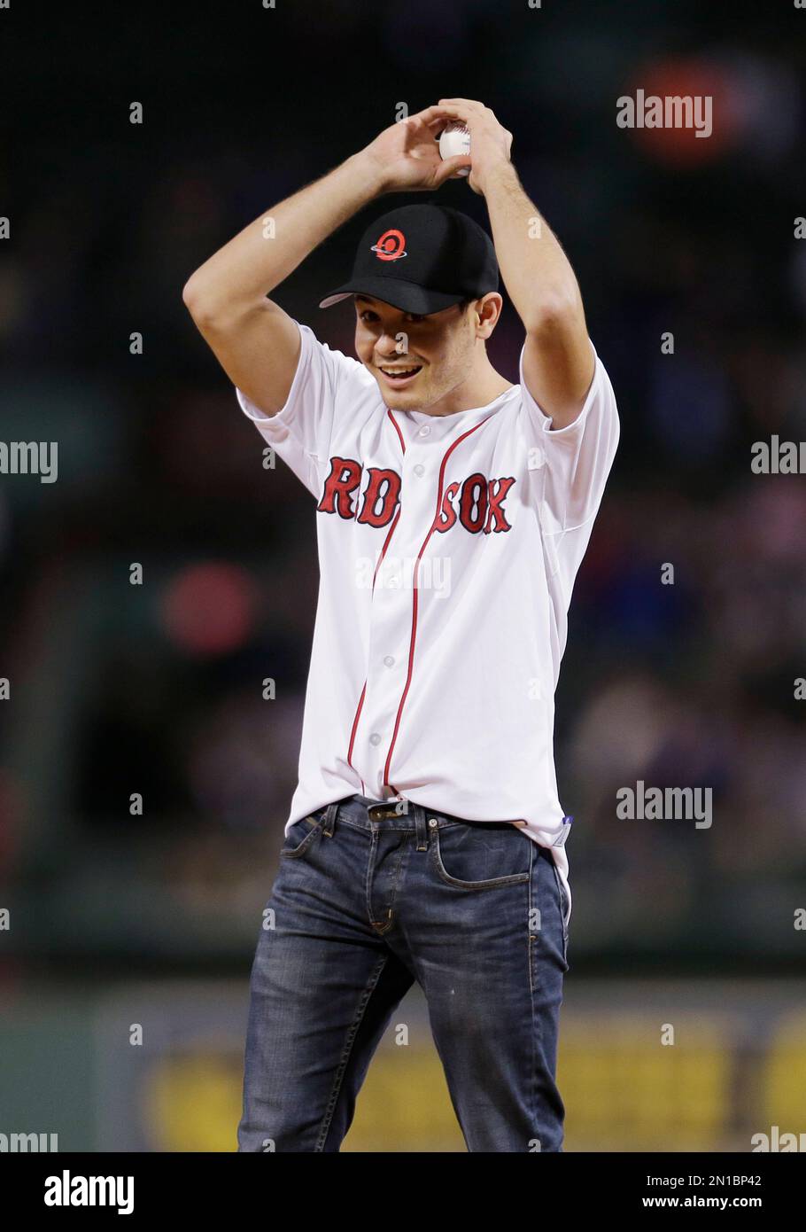 NASCAR driver Kyle Larson delivers the ceremonial first pitch before ...