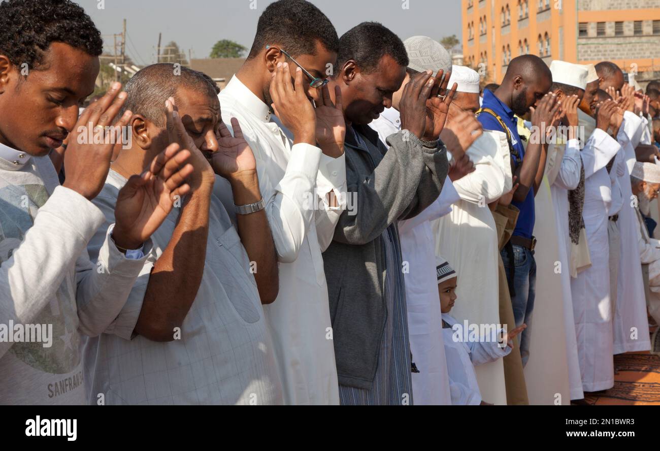Kenyan Muslims raise their hands as they offer prayers, Thursday, Sept ...