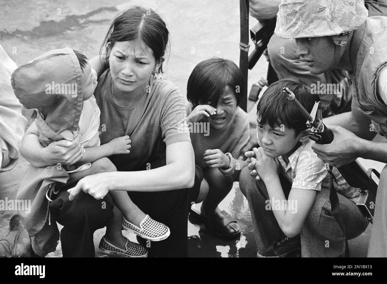 FILE - In this April 29, 1975, file photo, a South Vietnamese mother ...