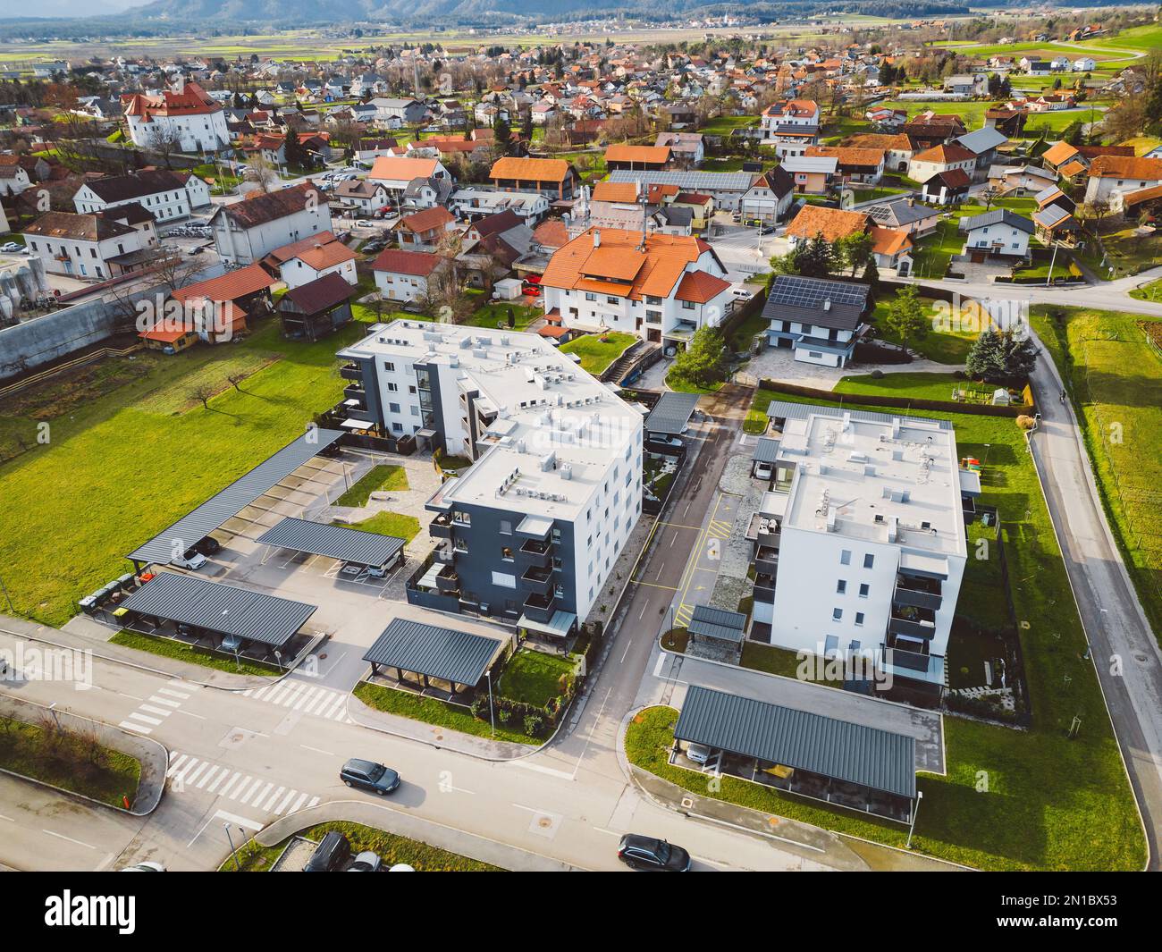 Aerial view of residential area with two new build residential ...
