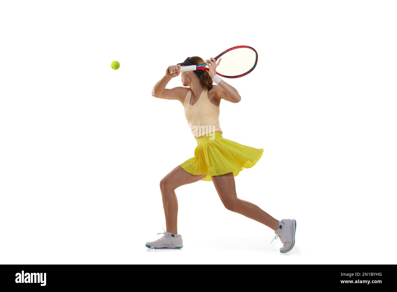 Back view of professional young female tennis player in sports uniform ...