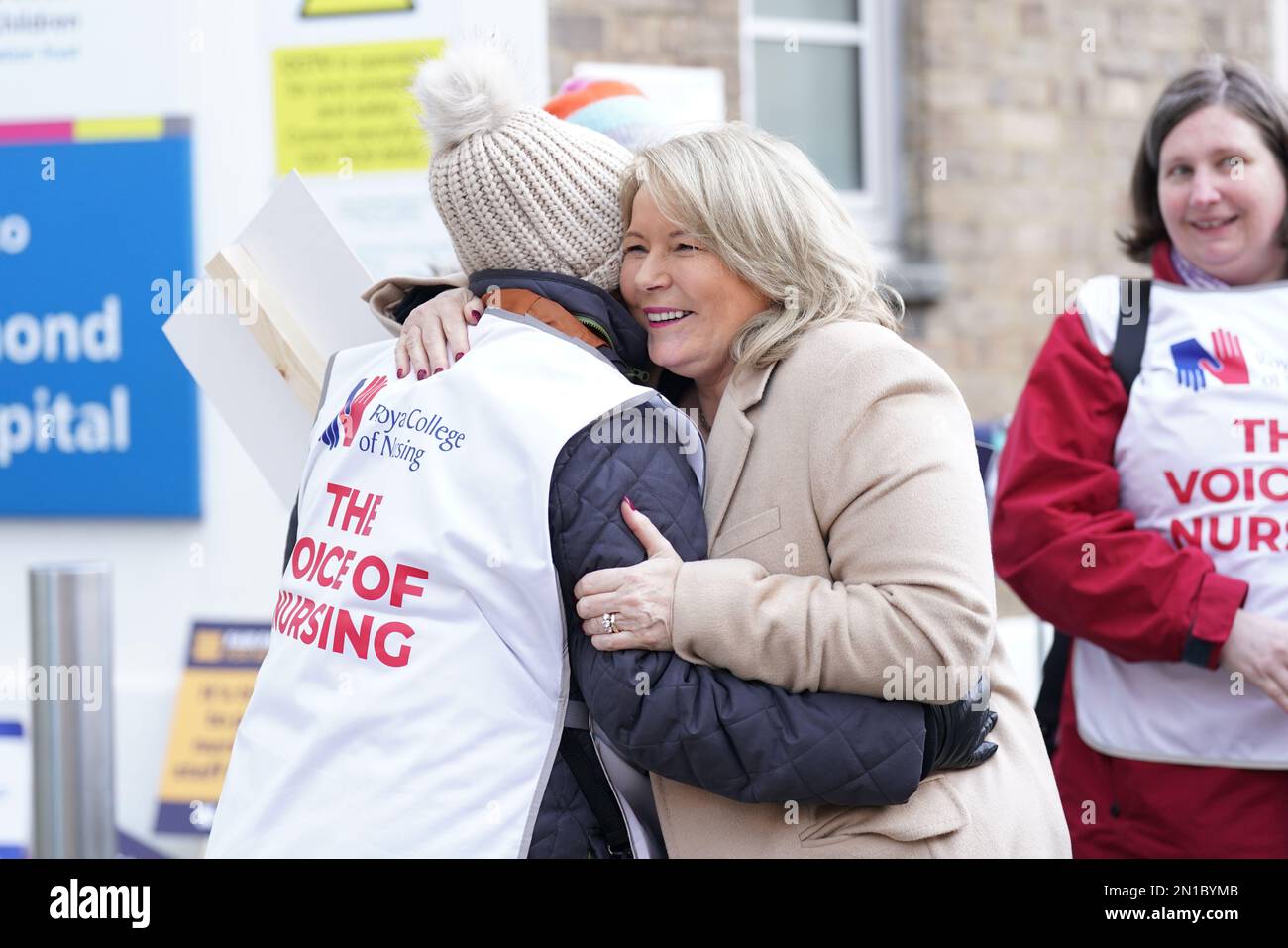 Royal College of Nursing (RCN) general secretary Pat Cullen, hugs a ...