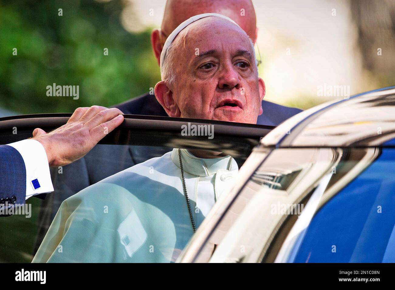 Pope Francis steps into his Fiat 500 to depart the Apostolic Nunciature ...