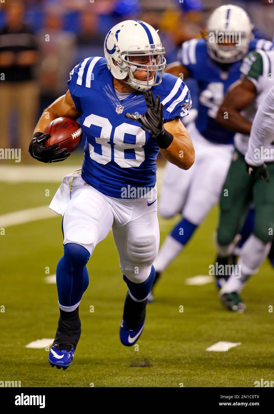 Indianapolis Colts fullback Tyler Varga (38) runs with the ball on a ...