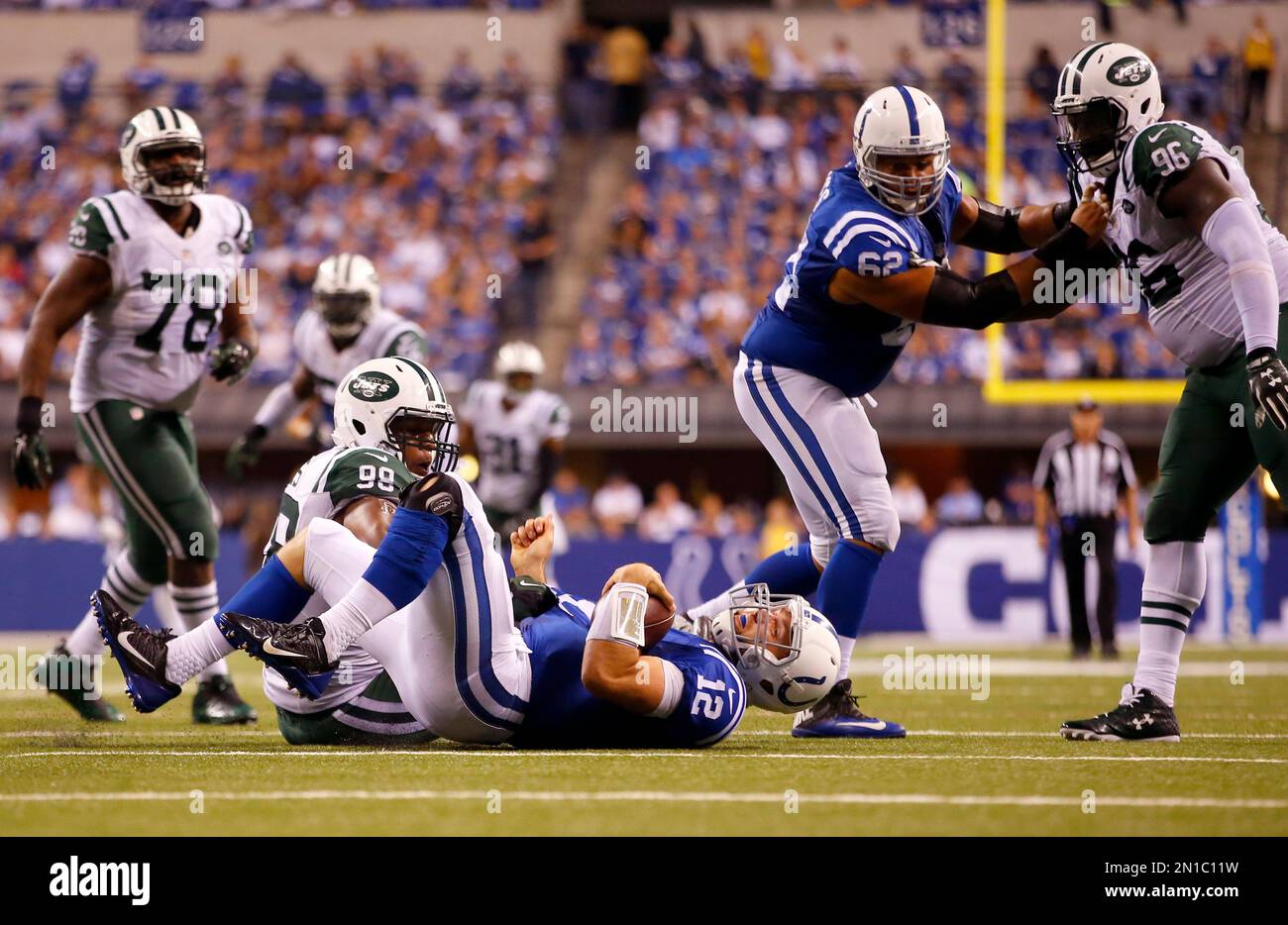 New York Jets outside linebacker Quinton Coples (98) brings down ...