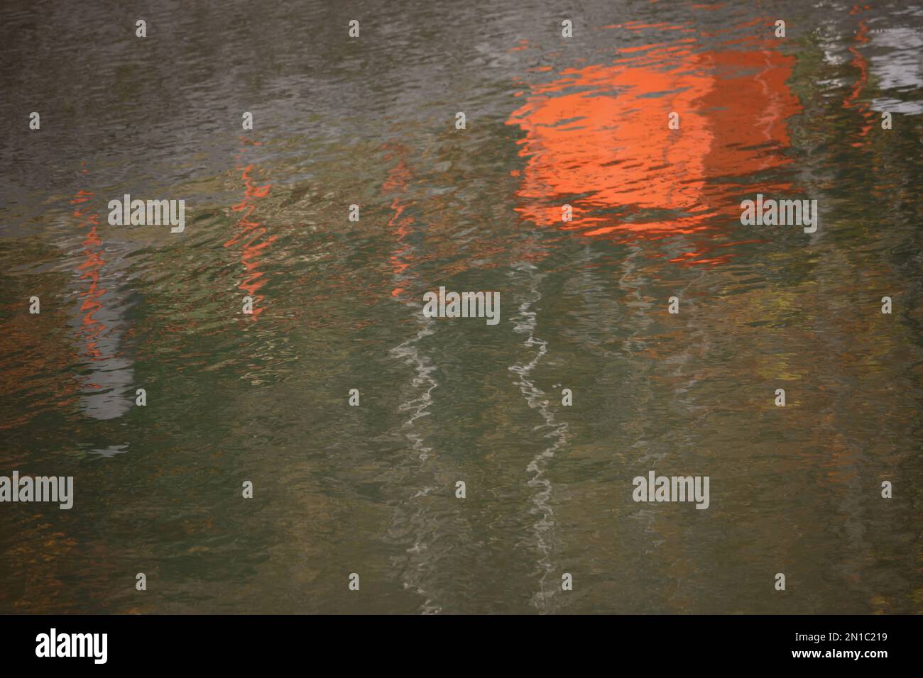 Orange cube reflected in rippled water Stock Photo - Alamy Orange cube reflected in rippled water Stock Photo - Alamy