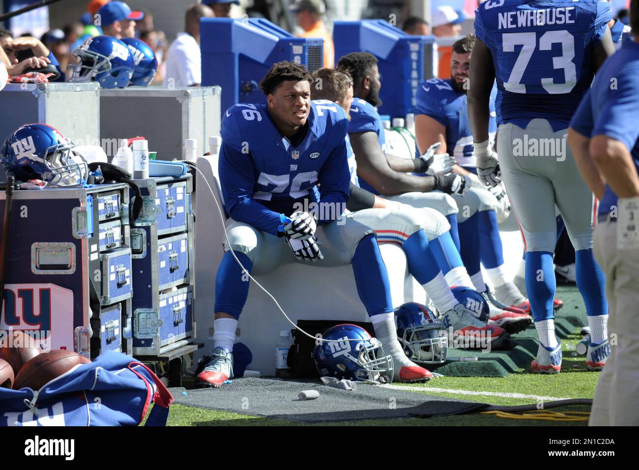 New York Giants tackle Ereck Flowers sits on the bench after he injured ...
