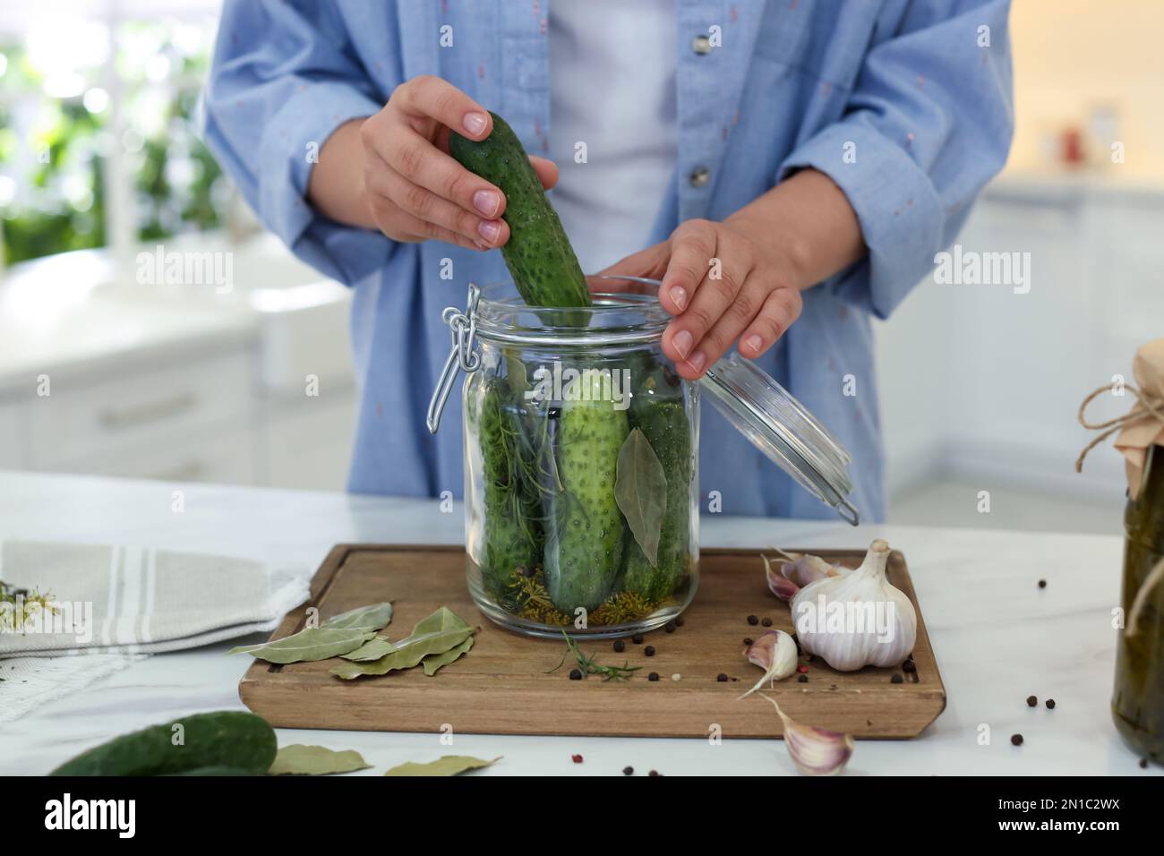 Woman jar preserve vegetables in hi-res stock photography and images ...