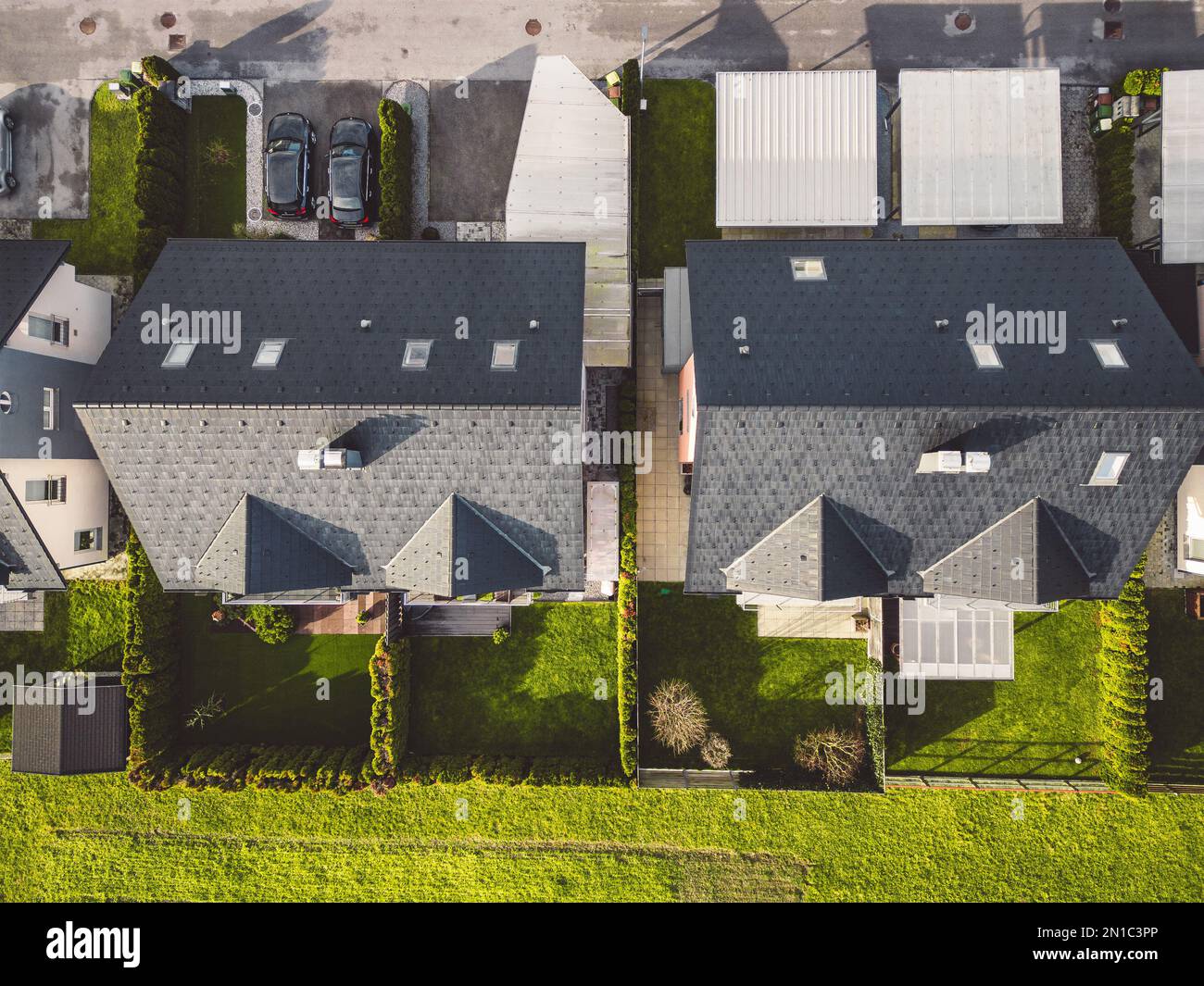 Top down view of suburban family homes, two duplex houses next to each ...