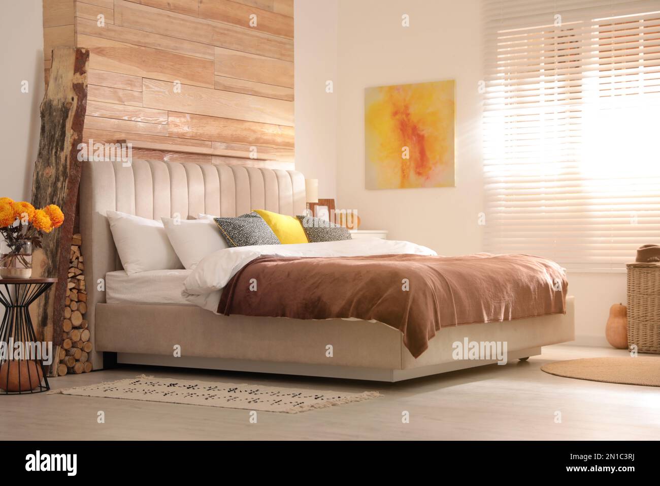 Cozy bedroom interior inspired by autumn color scheme Stock Photo - Alamy