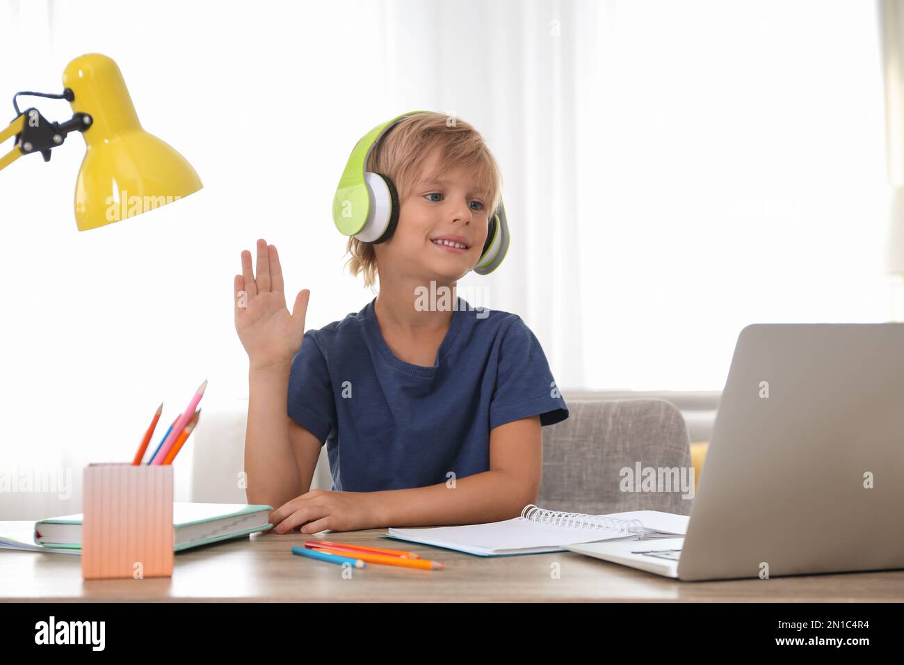 Little boy studying online at home. Distance learning during COVID-19 ...
