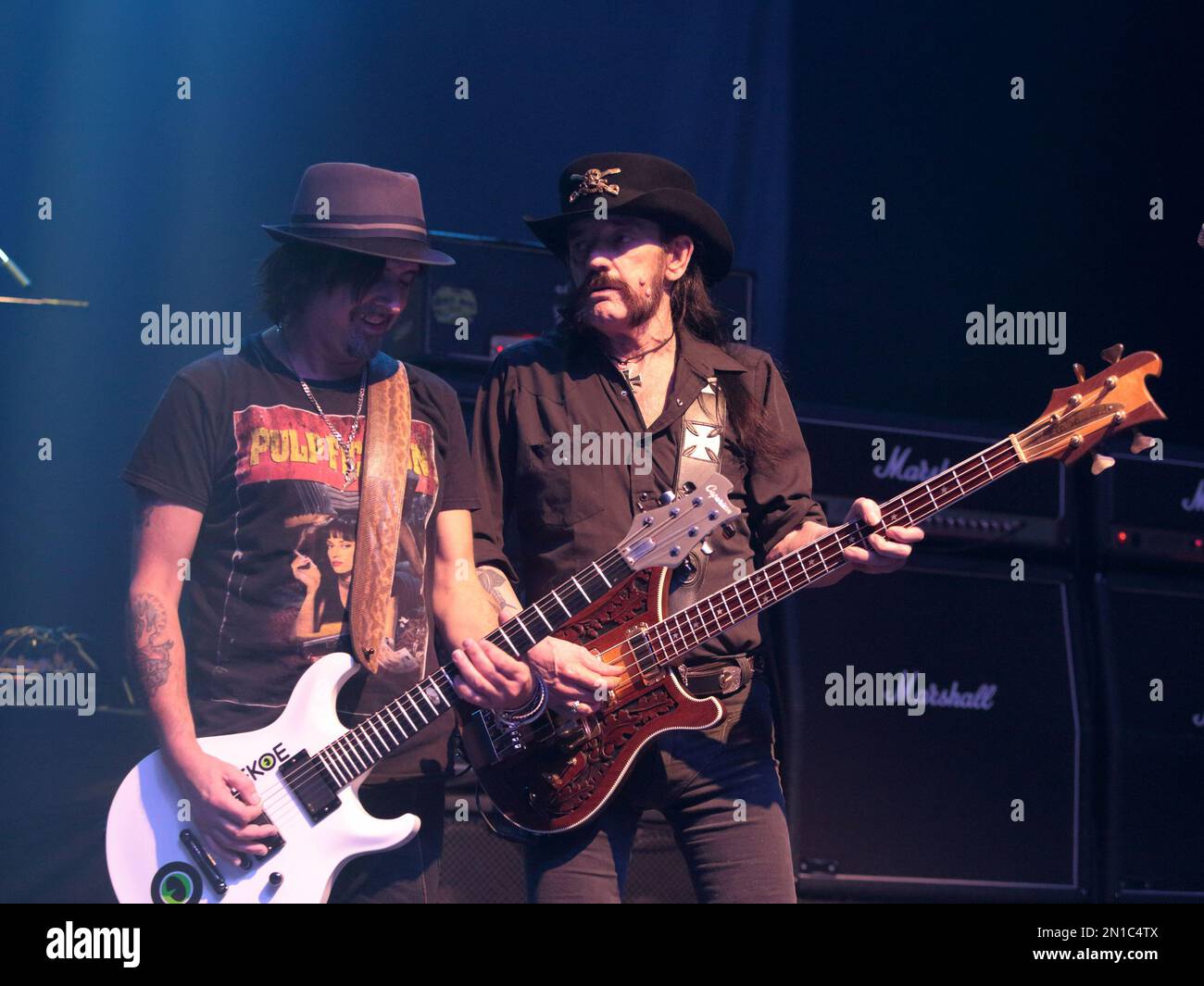 Phil Campbell, left, and Lemmy Kilmister of the band Motörhead perform in concert during their ...