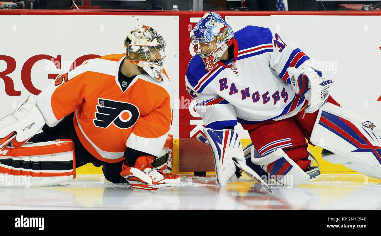 Philadelphia Flyers goalie Jason LaBarbera, left, and New York Rangers ...