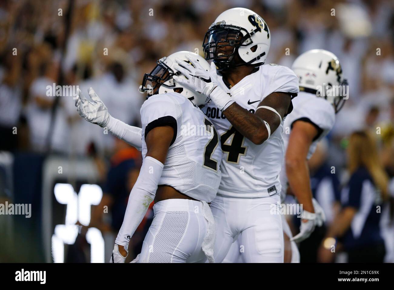 Colorado Buffaloes wide receiver Devin Ross, left, celebrates his ...