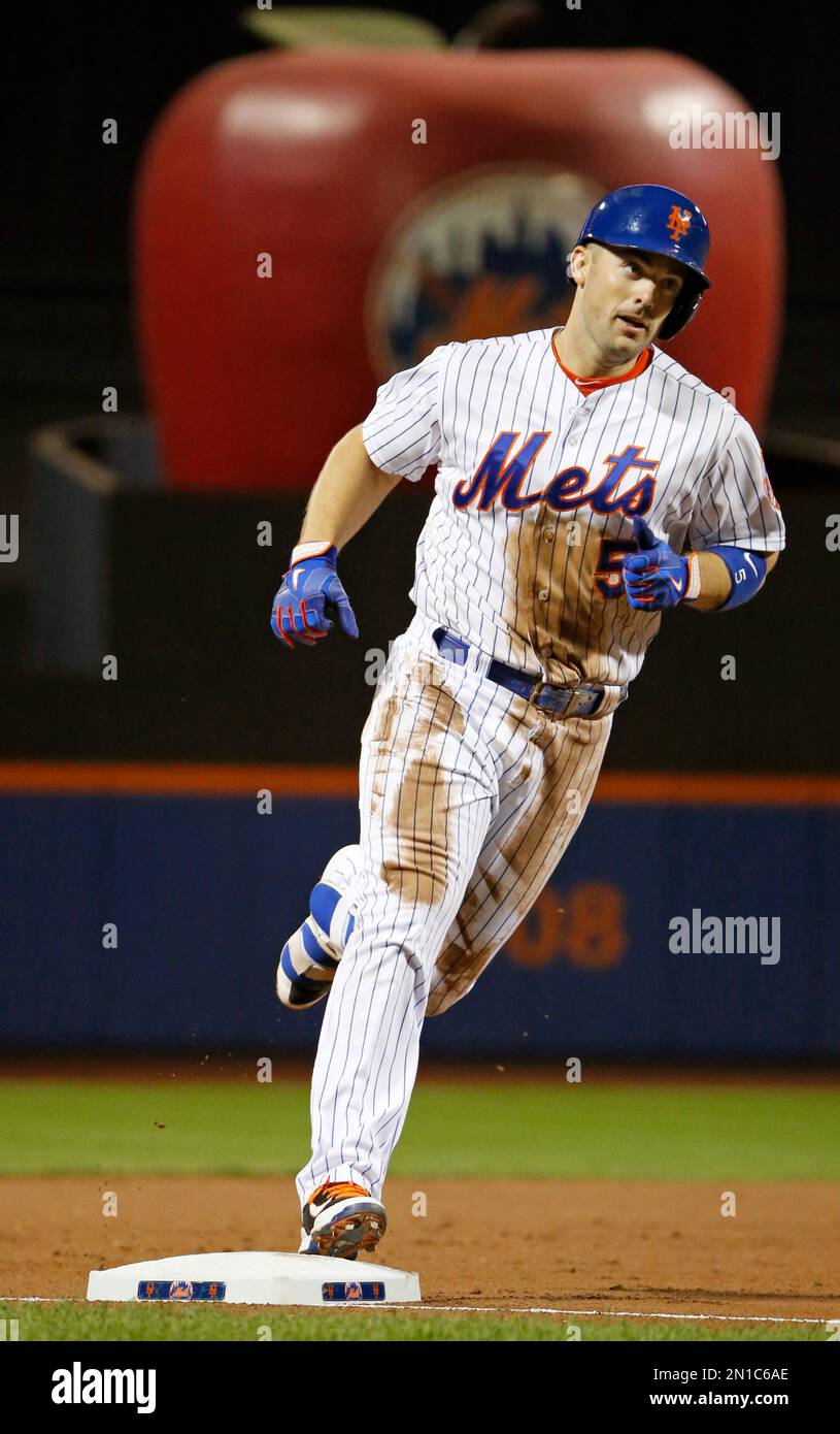 New York Mets' David Wright rounds third after hitting a first-inning ...