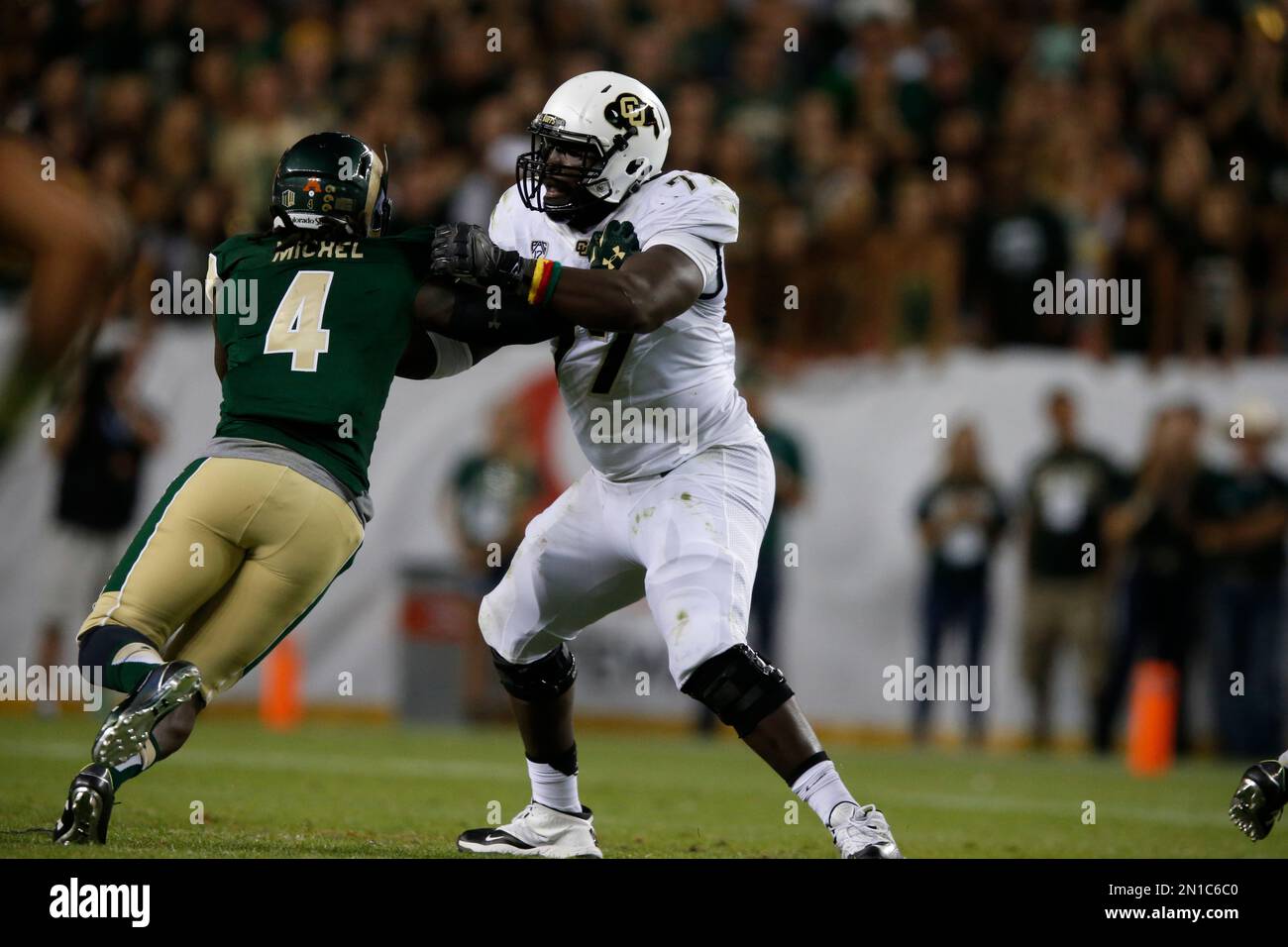 Colorado State Rams linebacker SteveO Michel (4) battles against ...