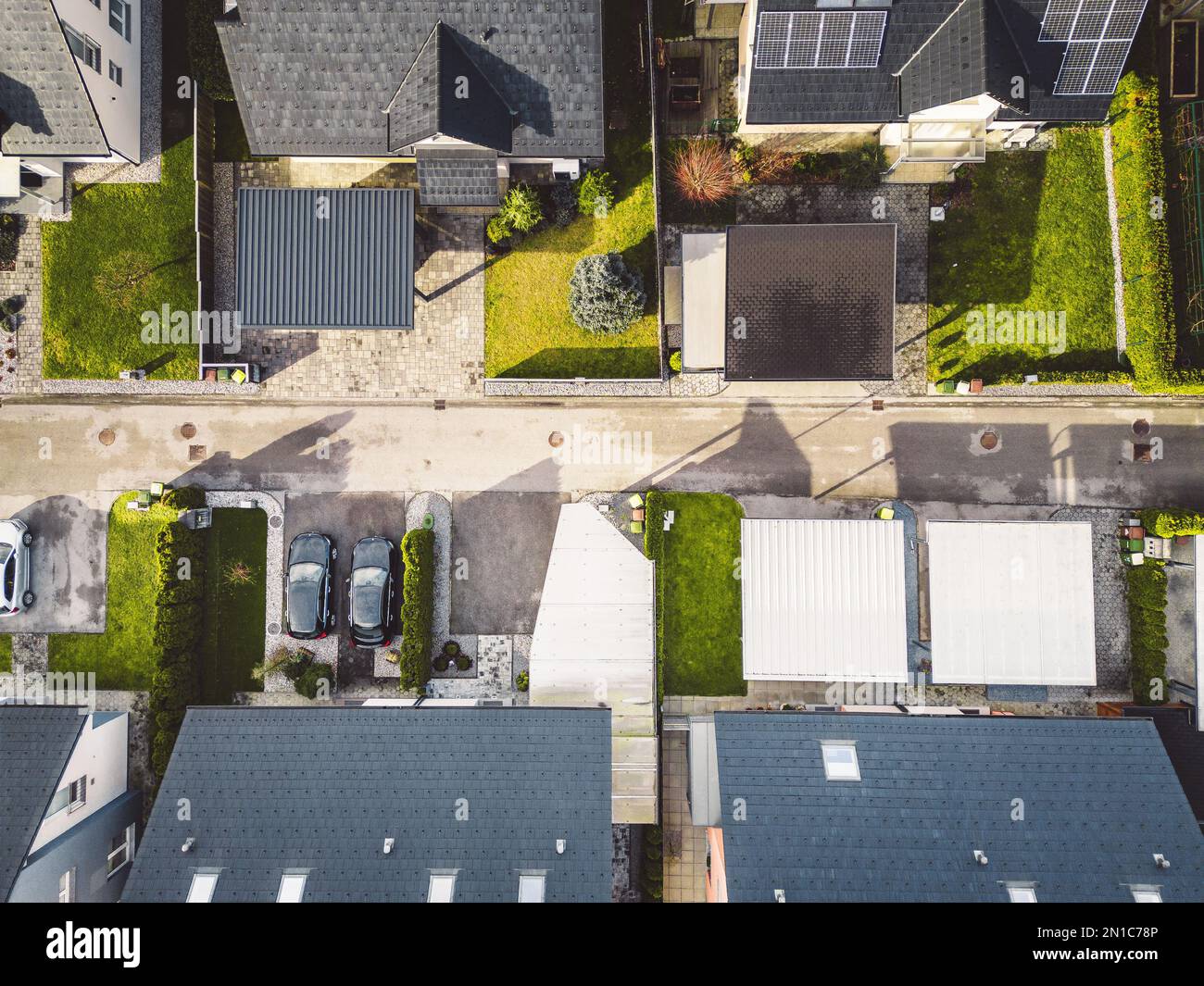 Top down view of an empty street in a suburban area with family homes ...