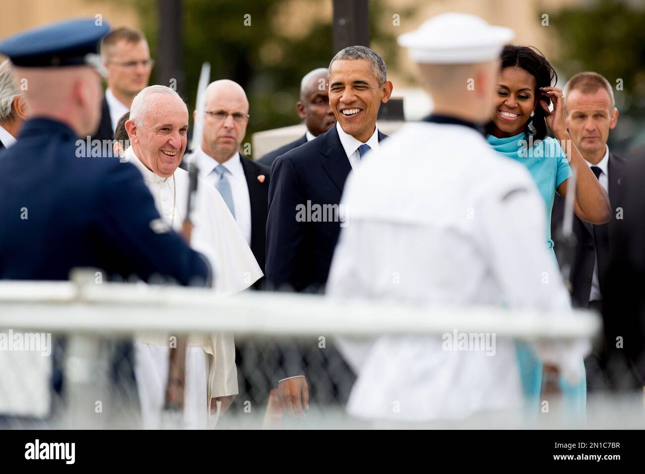 President Barack Obama and first lady Michelle Obama, second from right ...