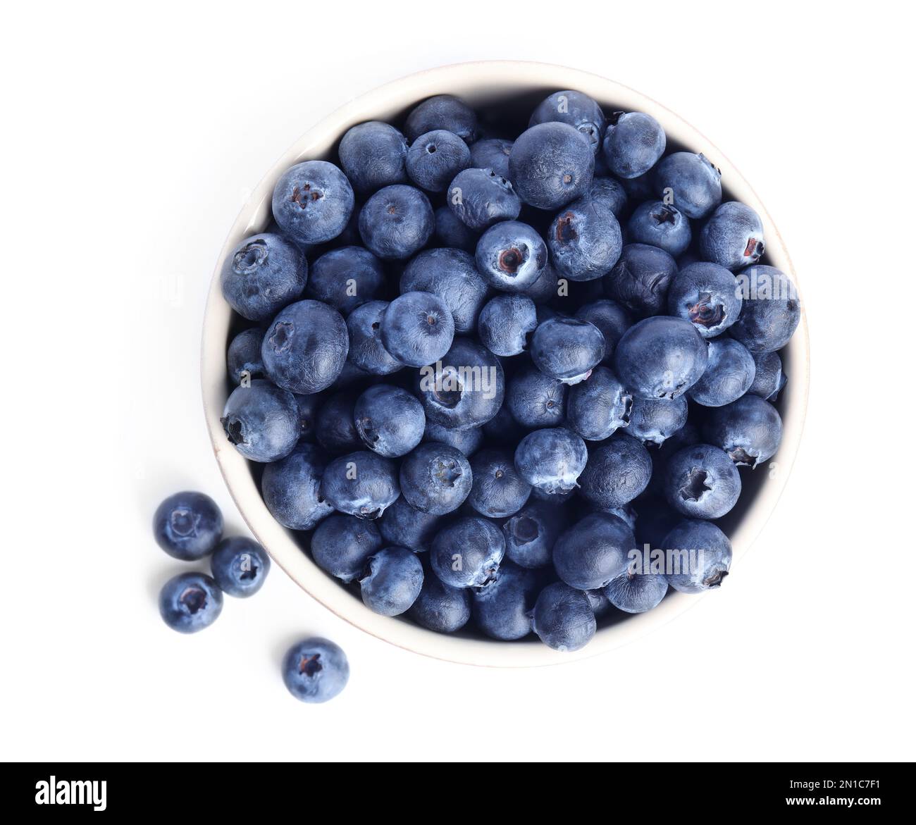 Fresh tasty blueberry in bowl isolated on white, top view Stock Photo ...