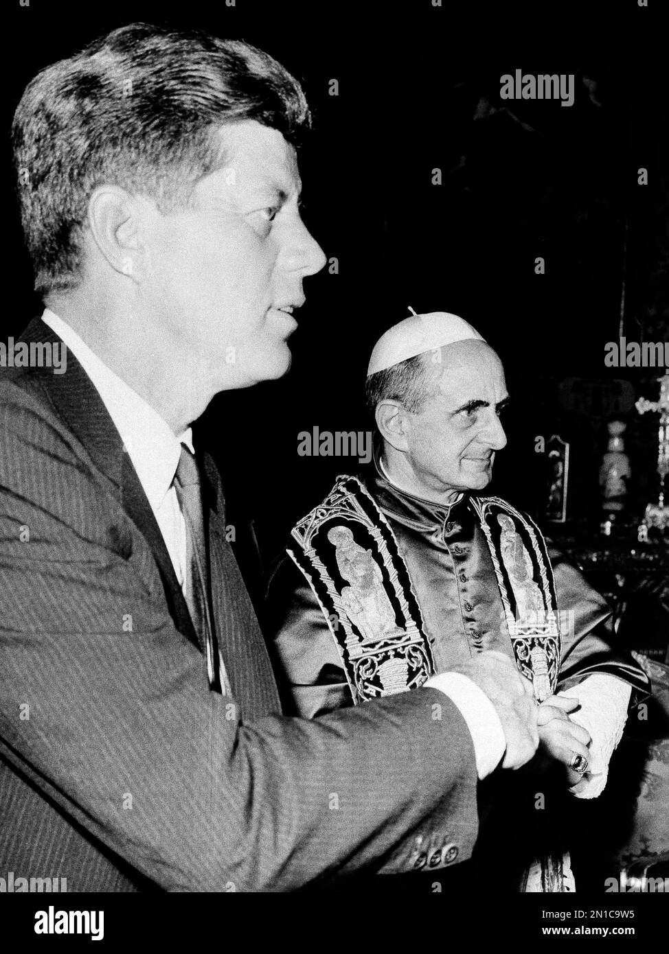 President John F. Kennedy stands with Pope Paul VI at an audience in ...
