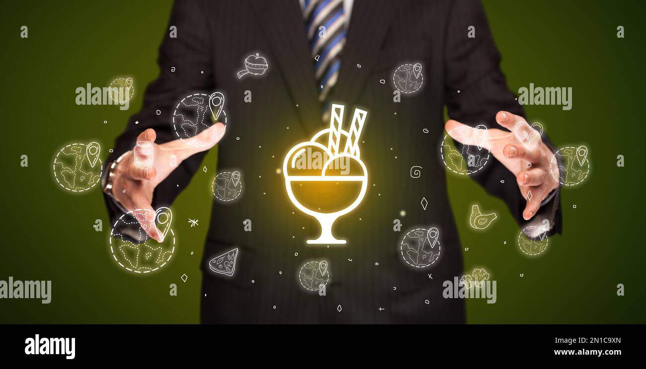 Hand holding food related icons Stock Photo - Alamy