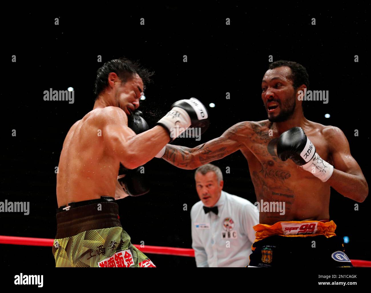 Panama's challenger Anselmo Moreno, right, hits a punch on the face of ...