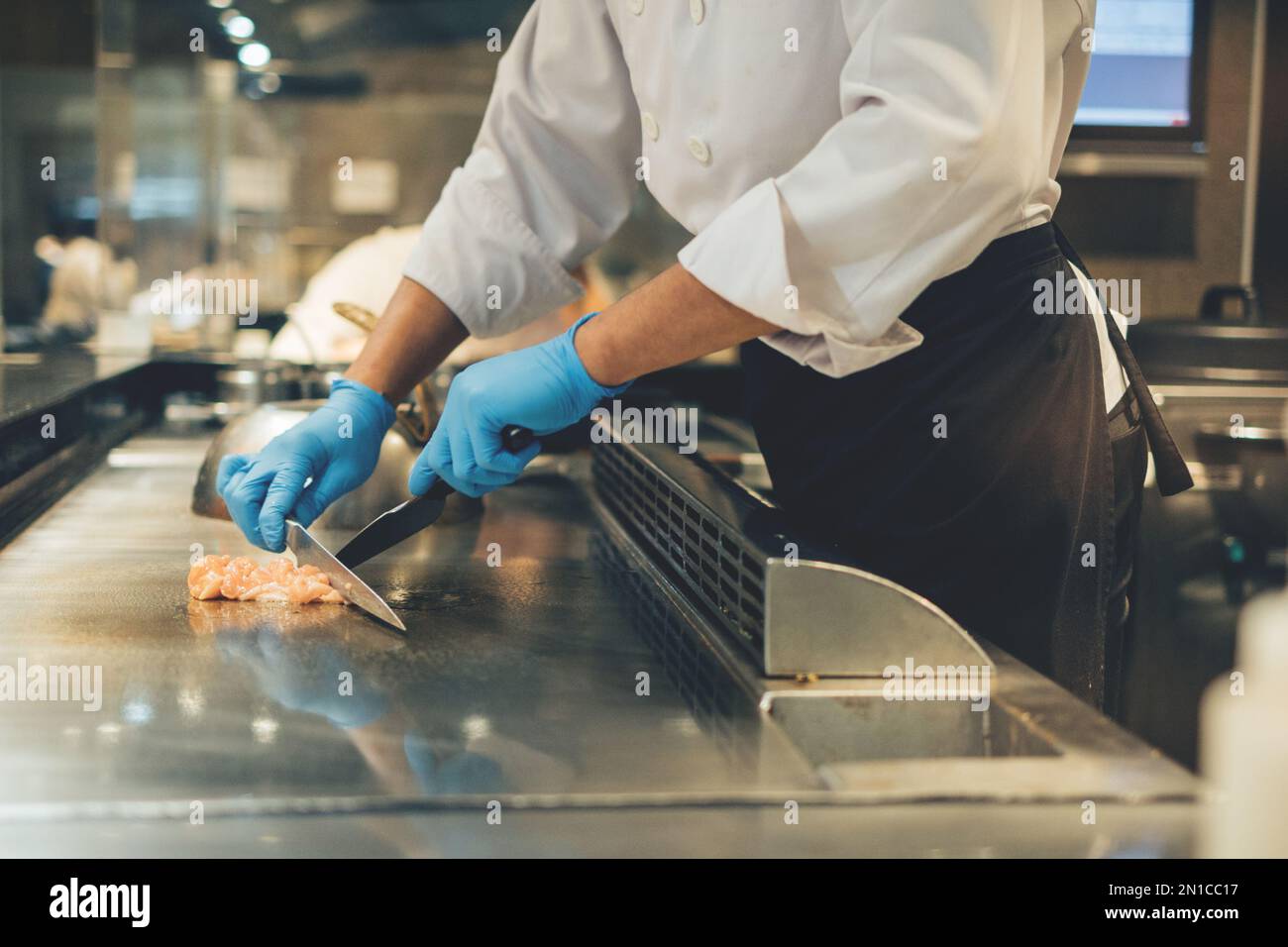 Hand of man take cooking of meat with vegetable grill, Chef cooking ...