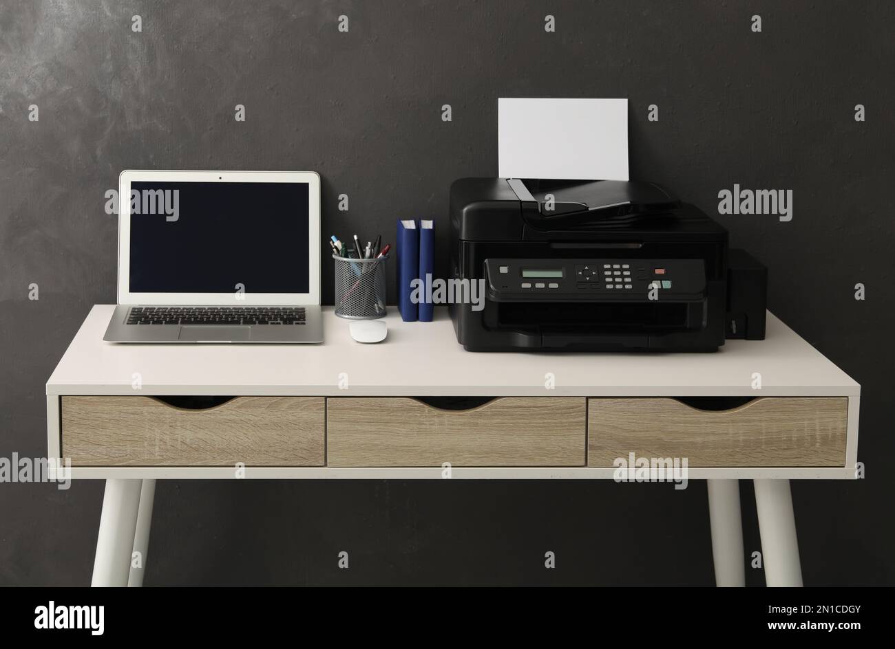 New modern printer, laptop and office supplies on white table Stock ...