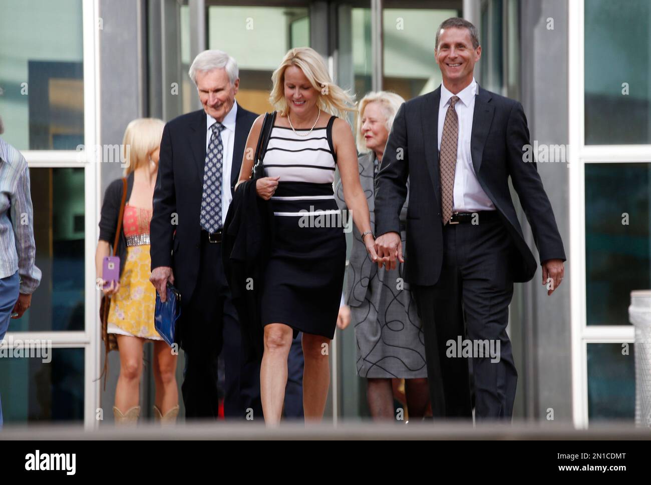 Paula Bertolet, front left, walks with her husband Barry Bertolet ...