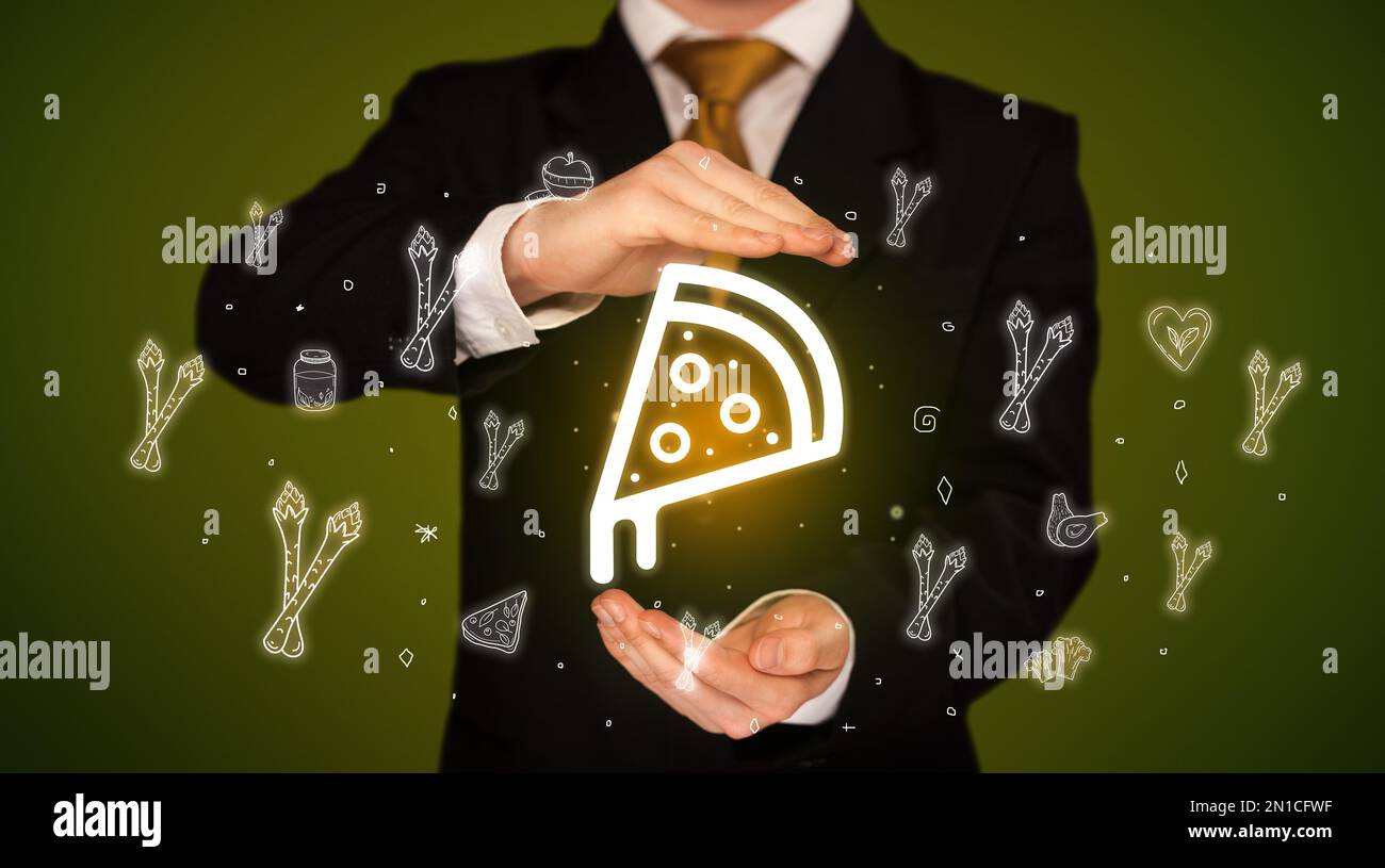 Hand holding food related icons Stock Photo - Alamy