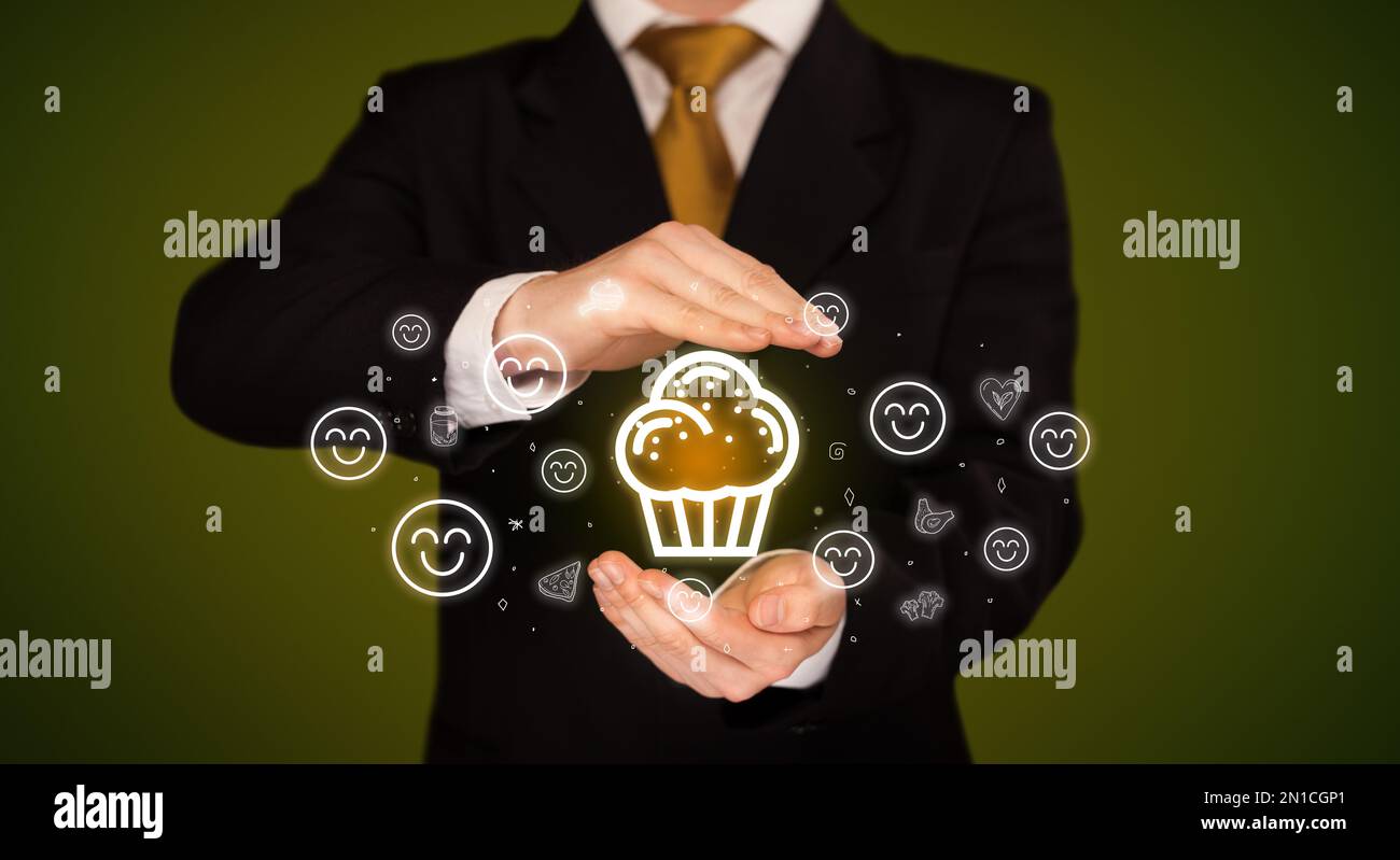 Hand holding food related icons Stock Photo - Alamy