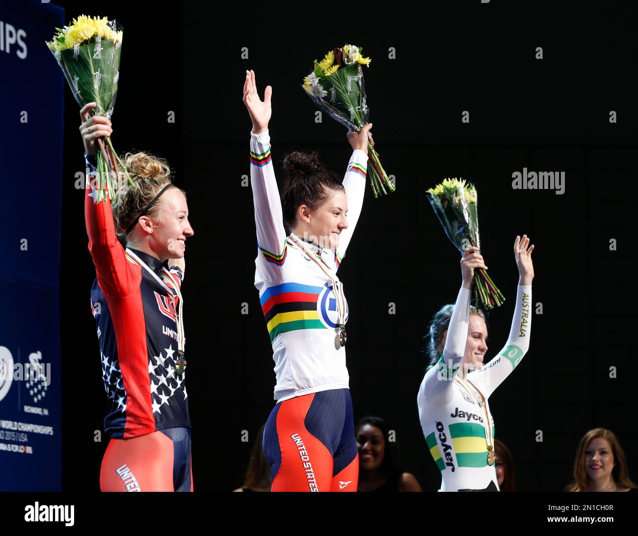 Chloe Dygert, of the United States, center, celebrates her Junior Women ...
