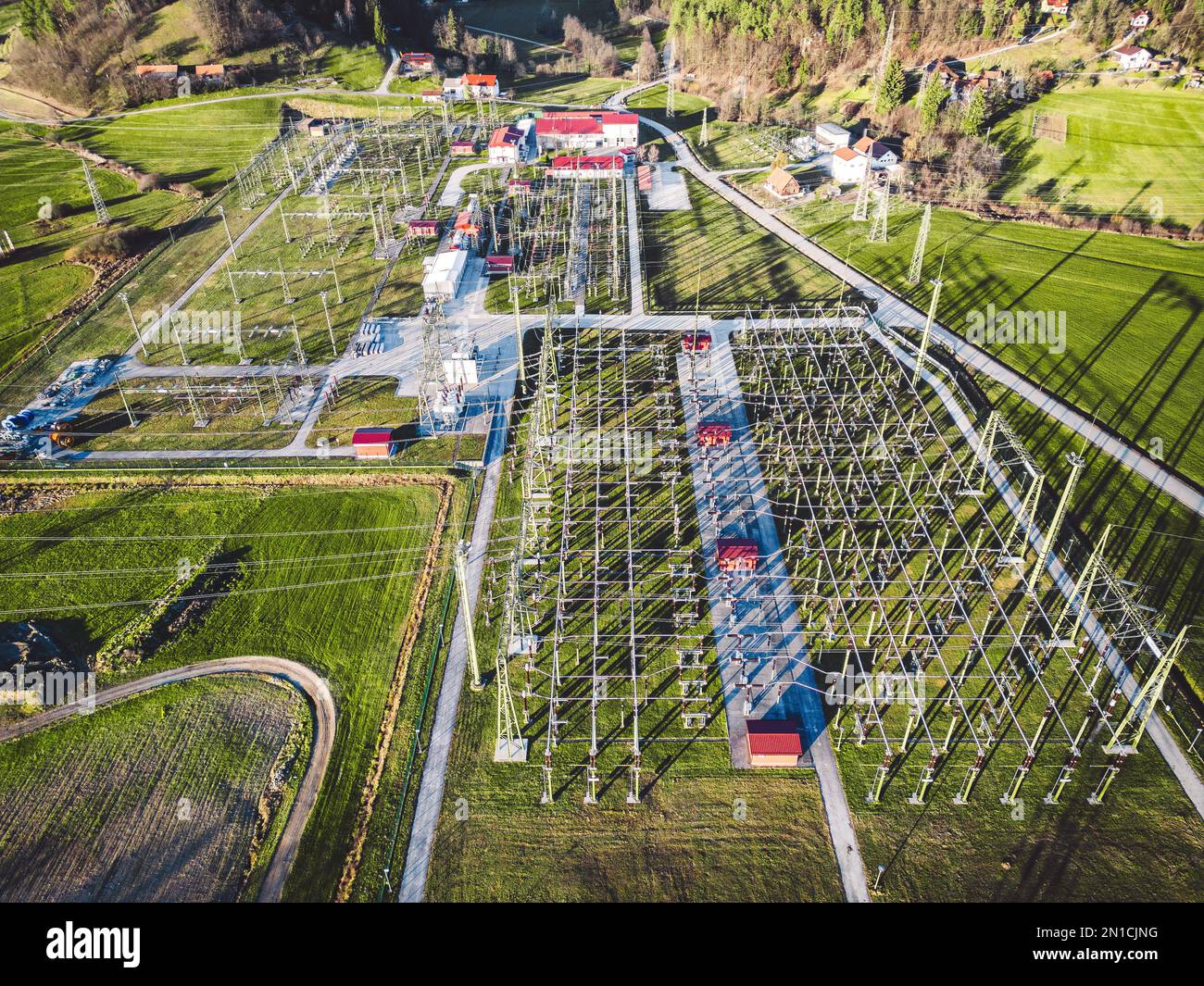 Aerial view of interlacement of electrical wires down at the power ...