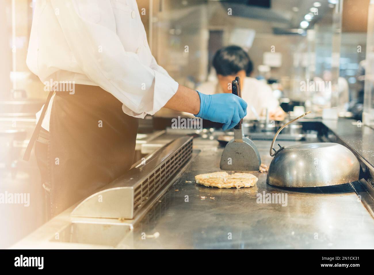 Hand of man take cooking of meat with vegetable grill, Chef cooking ...