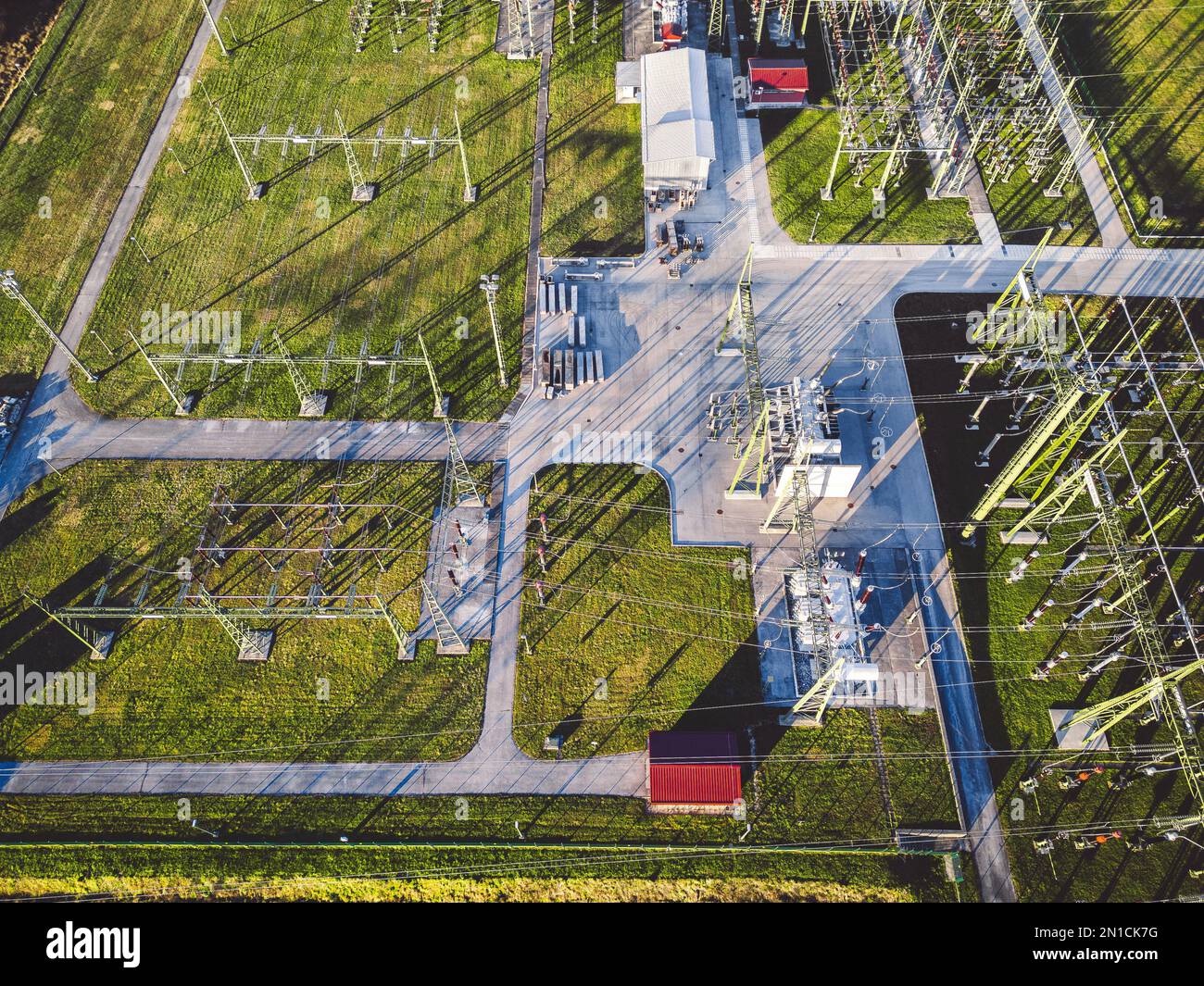 Top down aerial view, right above electrical power substation in the ...