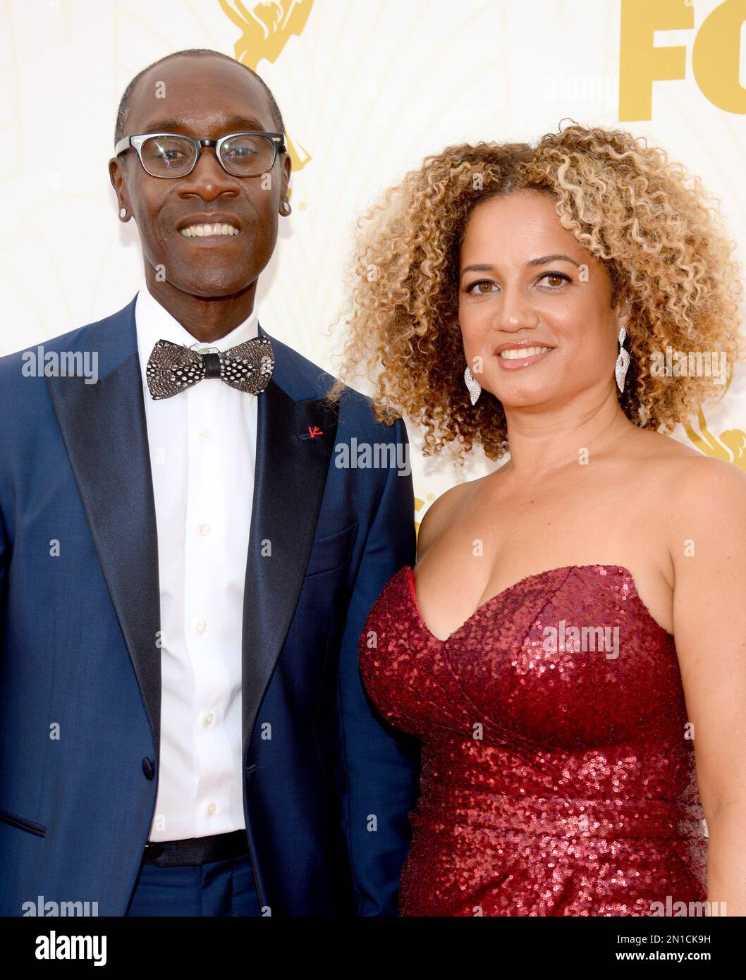 Don Cheadle, left, and Bridgid Coulter arrive at the 67th Primetime ...