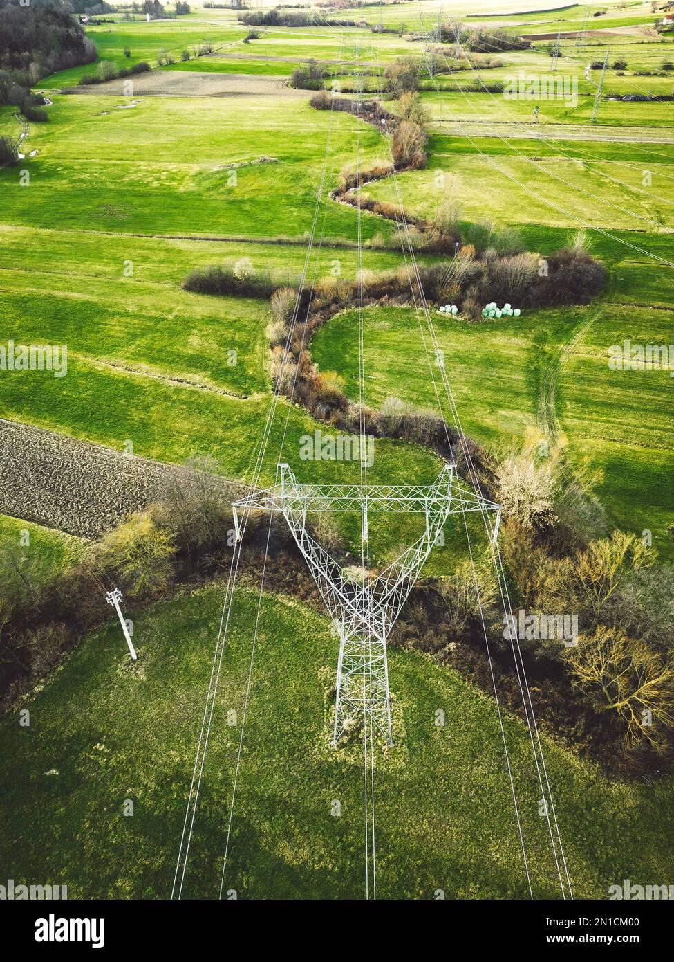 Vertical photo directly above centered on the electrical tower an ...