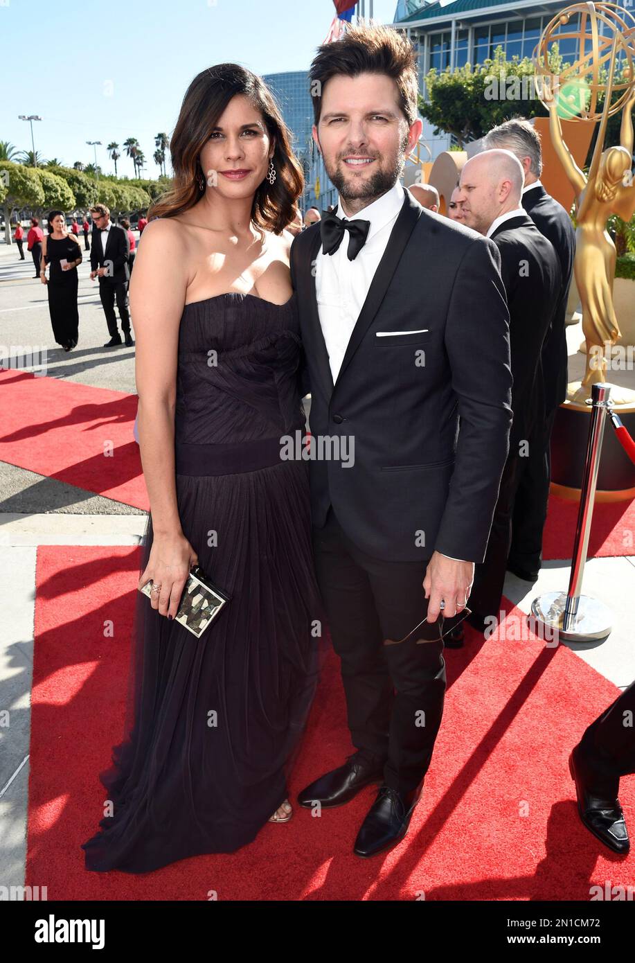 Naomi Scott, left, and Adam Scott arrive at the 67th Primetime Emmy Awards on Sunday, Sept. 20 ...