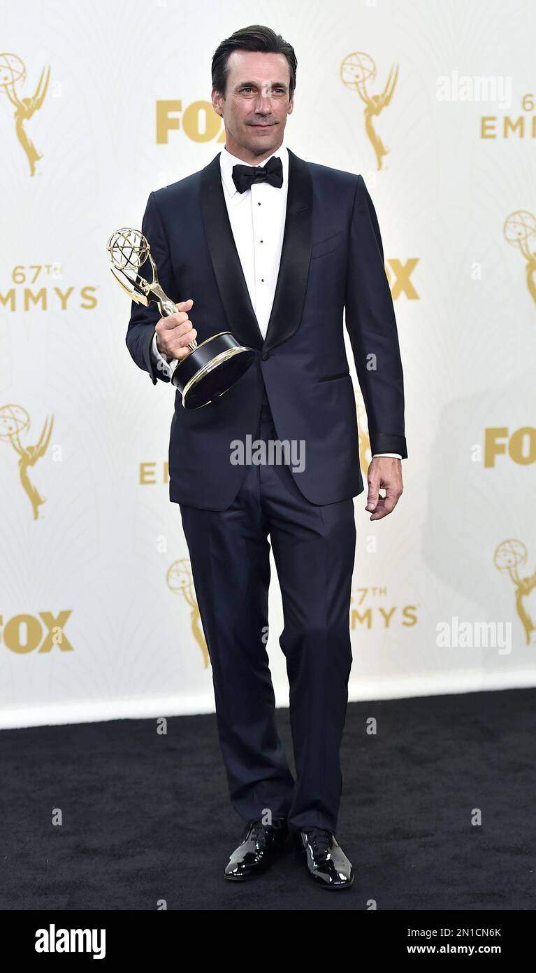 Jon Hamm with the award for outstanding lead actor in a drama series ...