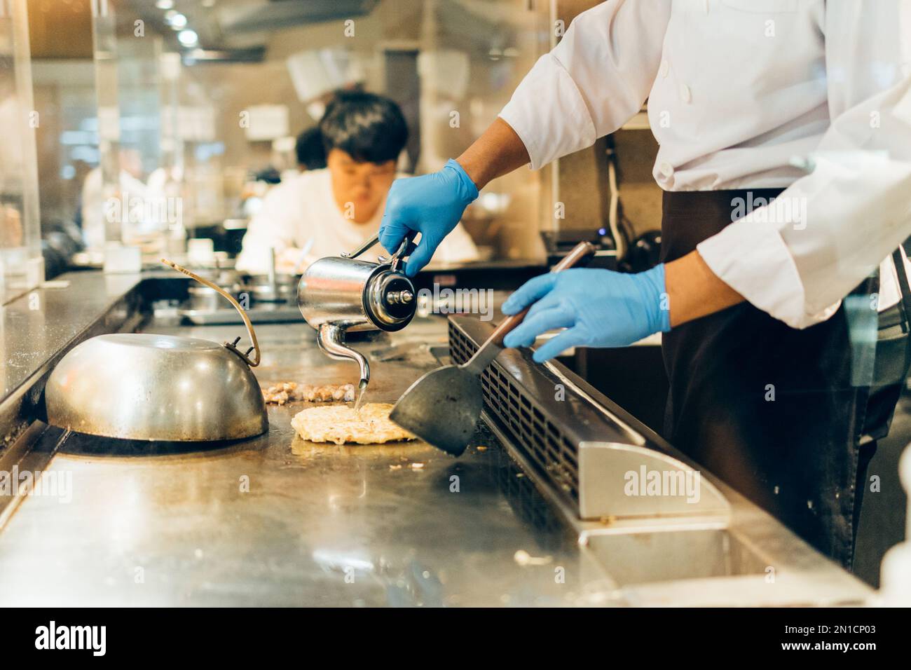 Hand of man take cooking of meat with vegetable grill, Chef cooking ...