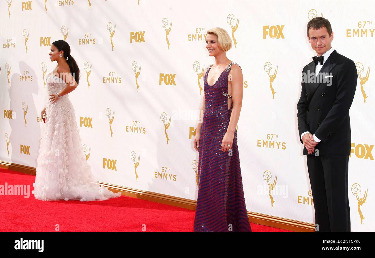 Gina Rodriguez , from left, Claire Danes, and Hugh Dancy arrive at the ...