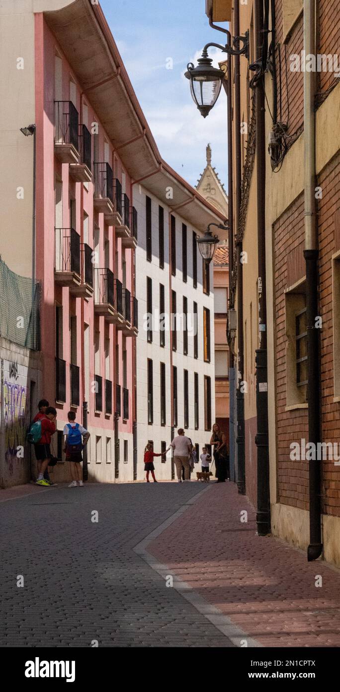 A street surrounded by buildings in Leon Stock Photo - Alamy