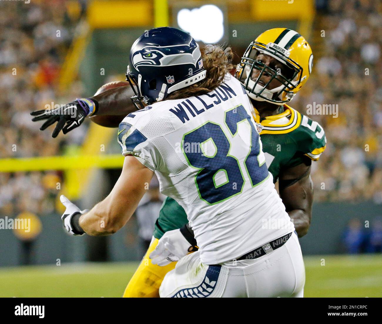 Green Bay Packers' Nate Palmer breaks up a pass intended for Seattle ...