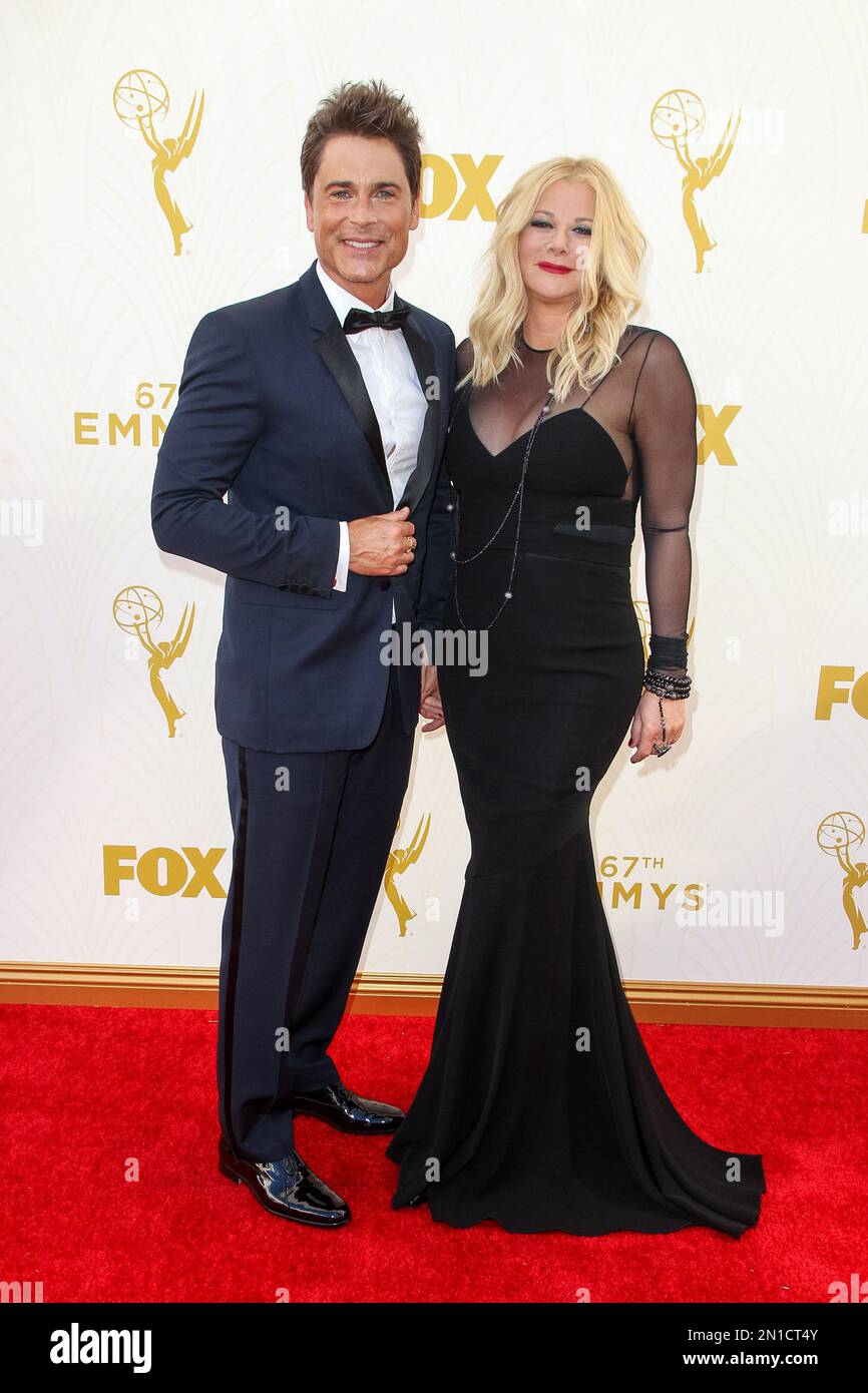 Rob Lowe, left, and Sheryl Berkoff arrive at the 67th Primetime Emmy ...