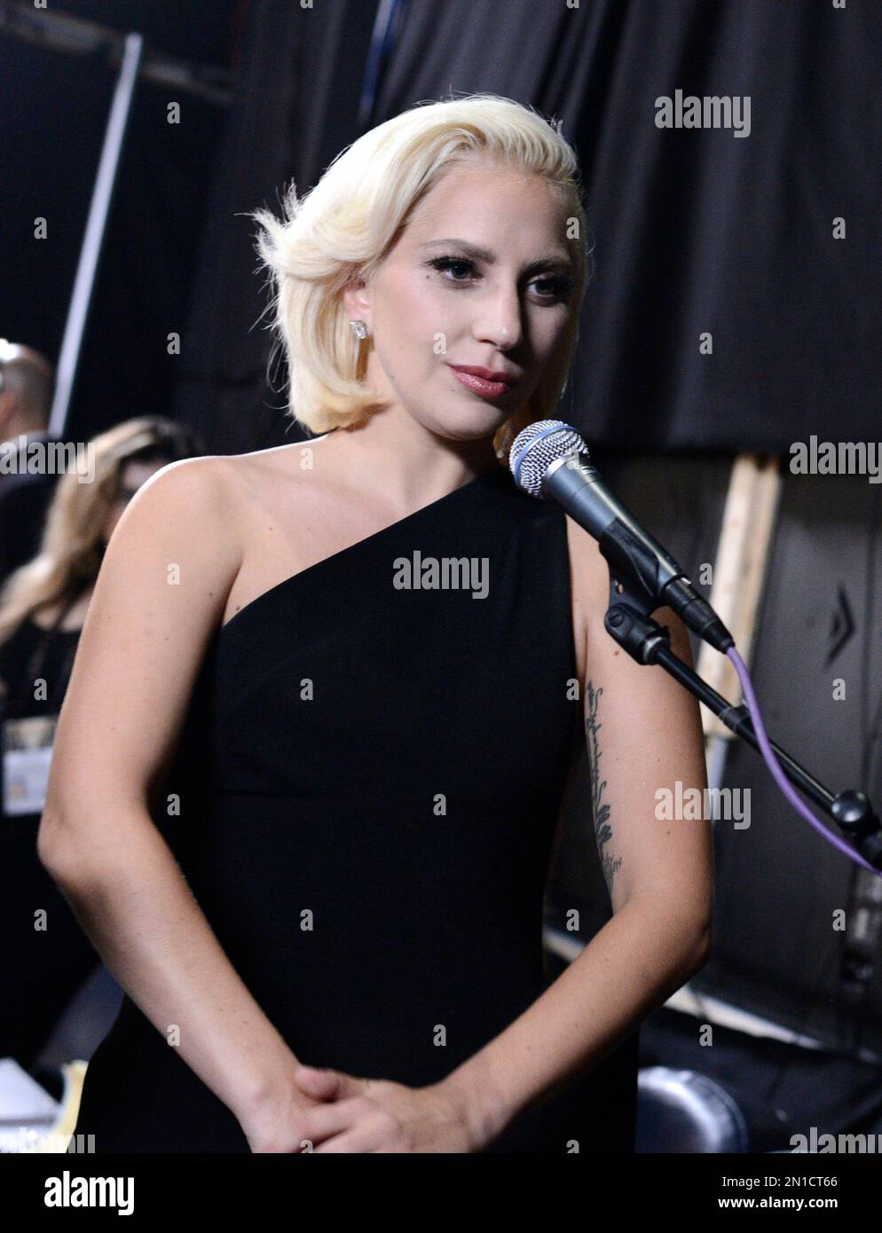 Lady Gaga participates in an interview backstage at the 67th Primetime ...