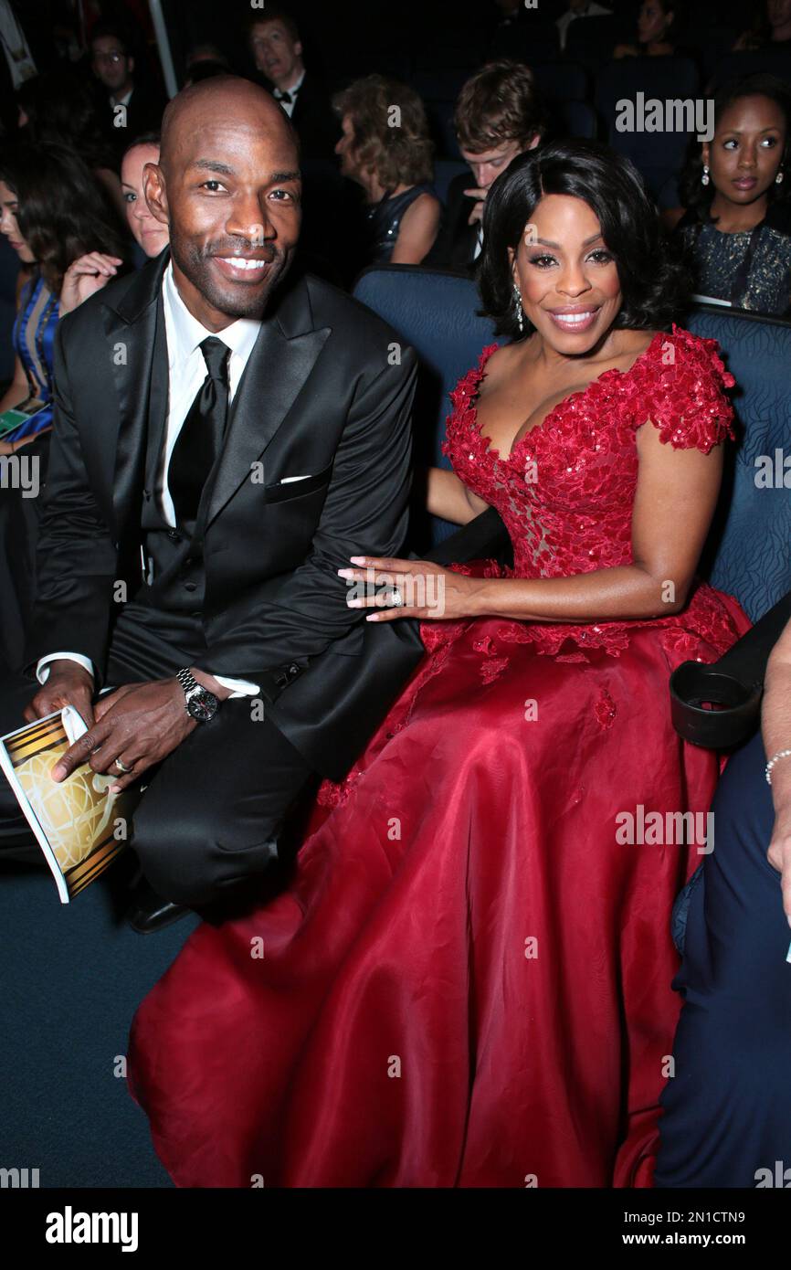 EXCLUSIVE - Jay Tucker, left, and Niecy Nash attend the 67th Primetime ...