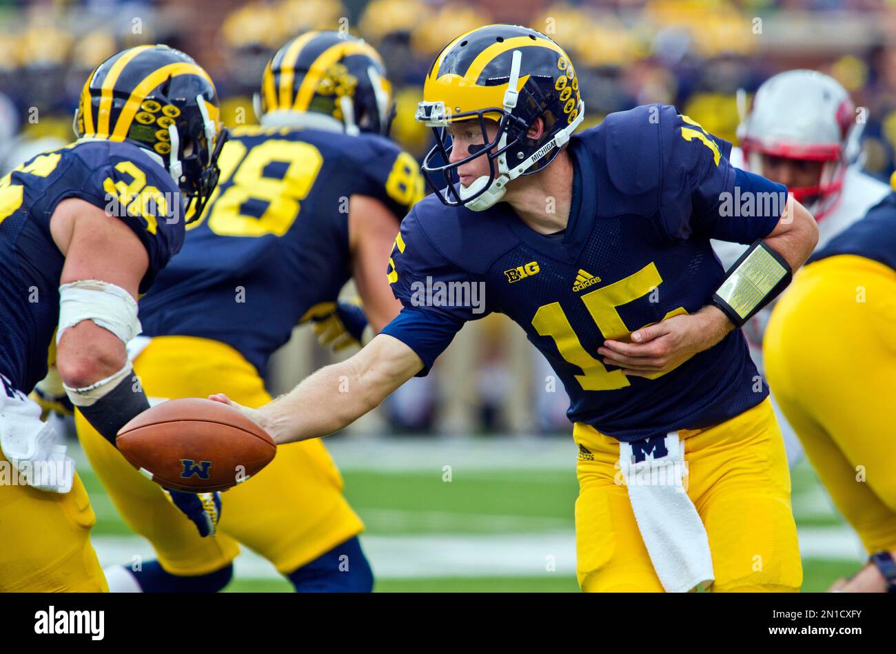 Michigan quarterback Jake Rudock (15) holds the football out for a ...