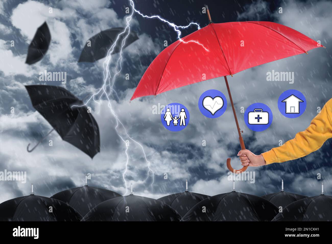 Insurance agent covering illustrations with red umbrella during storm ...