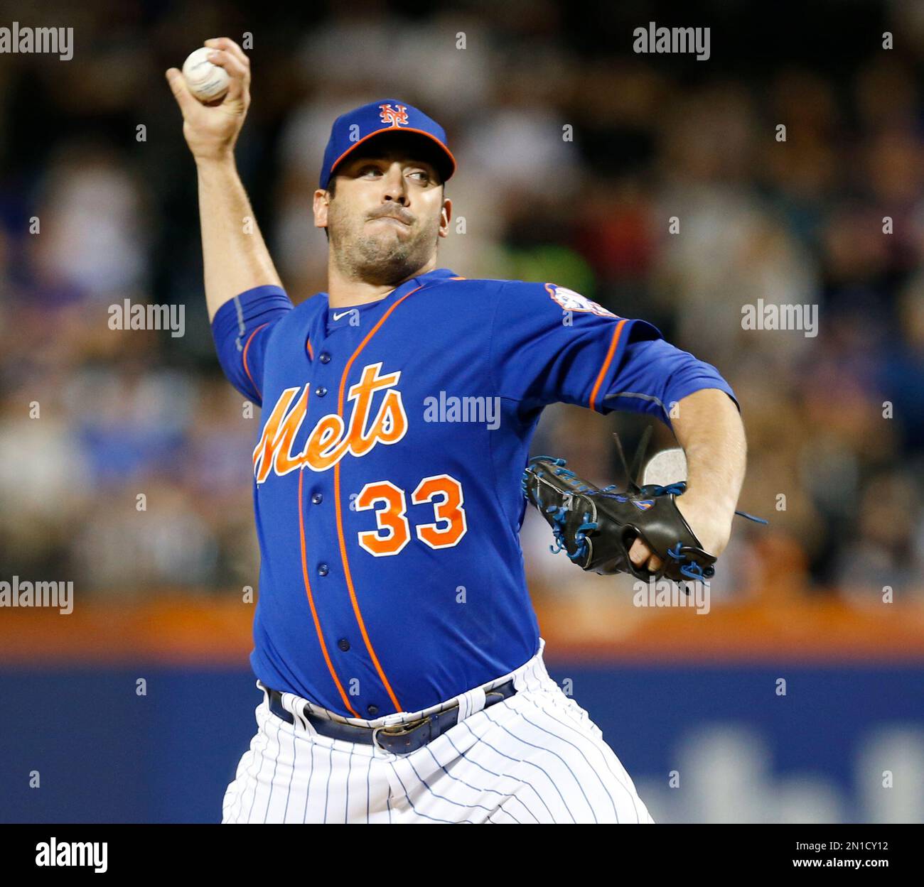 New York Mets starting pitcher Matt Harvey delivers in the first inning ...